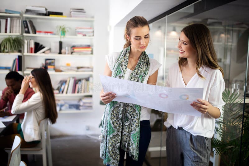Group of Business People Collaborating on Project in Office Stock Image ...