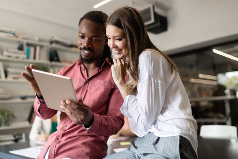 Group of Business People Collaborating on Project in Office Stock Image ...