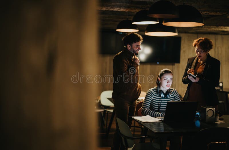 Group of Business People Discussing and Analyzing Data for an ...