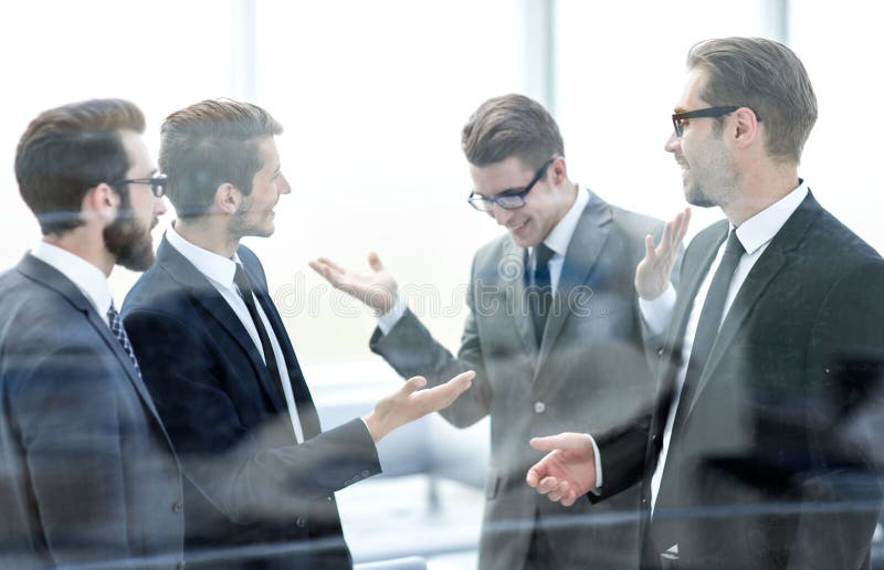 Group of Business People Discussing Common Interests in the Office ...