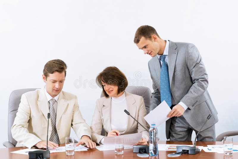 Group of Business People Discussing Documents Stock Image - Image of ...