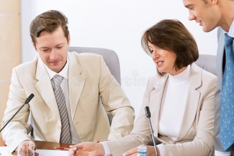 Group of Business People Discussing Documents Stock Image - Image of ...