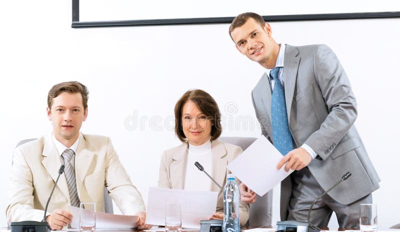 Group of Business People Discussing Documents Stock Photo - Image of ...