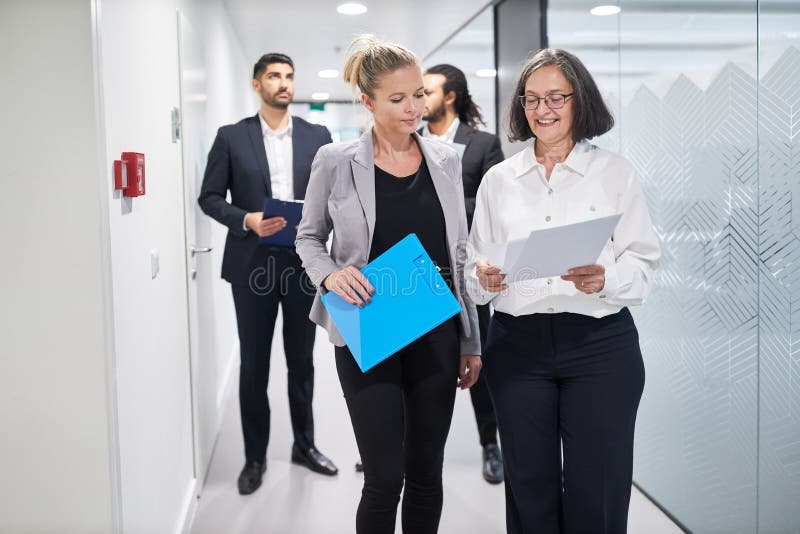 Group of Business People with Documents at Project Planning Stock Photo ...