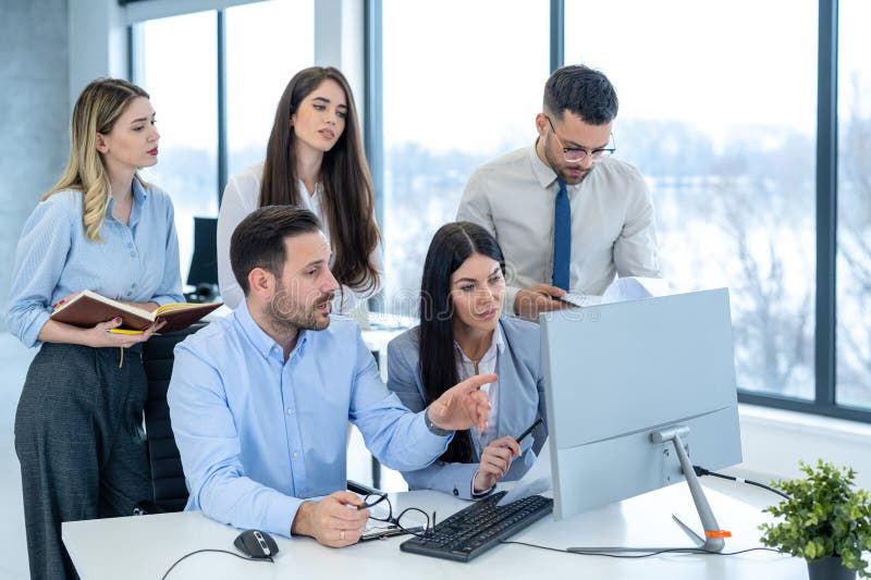 Group of Business People Looking at Computer Screen and Getting Upset ...