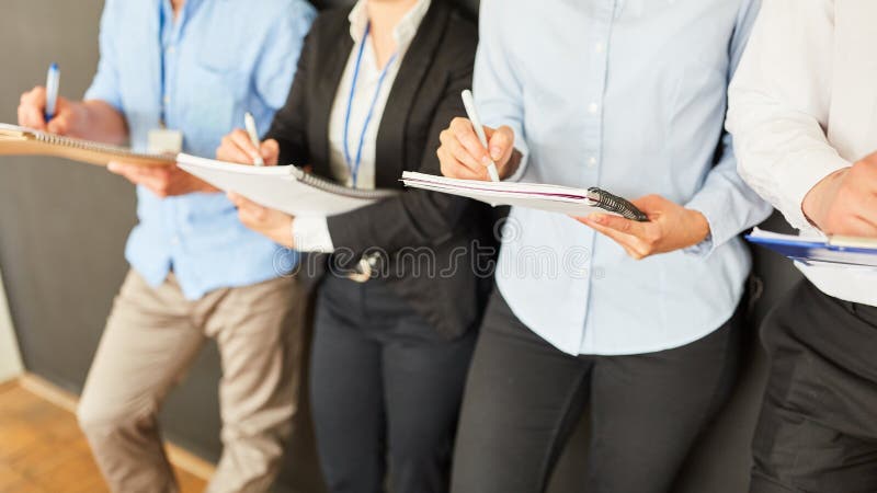 Group of Business People Makes Notes with Pen Stock Image - Image of ...