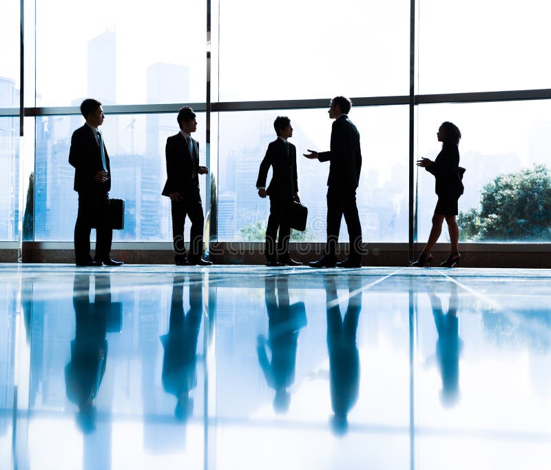 Group of Business People Meeting in Back Lit Stock Image - Image of ...