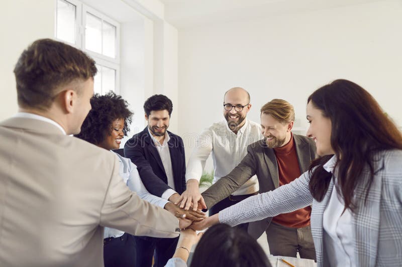 Business Team Stacking Hands in Circle of Unity Stock Image - Image of ...