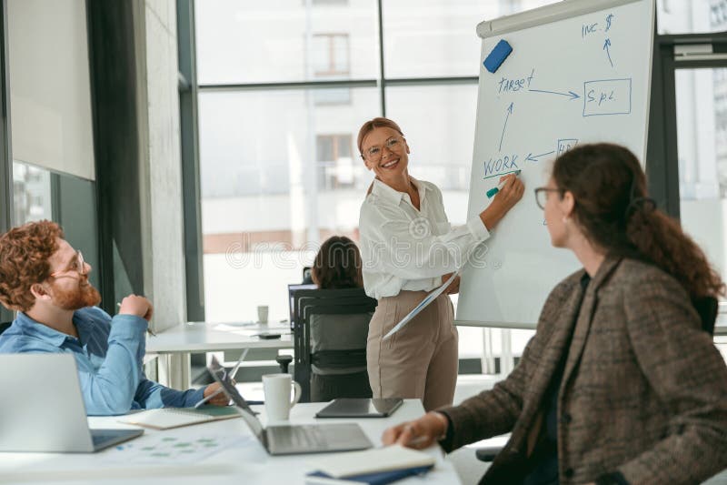 A Group of Business People Partners during a Set Team Meeting in the ...