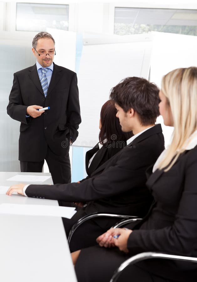Group of Business People at Presentation Stock Photo - Image of adult ...