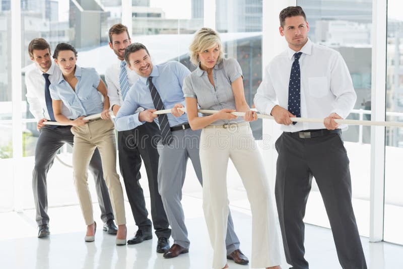 Group of Business People Pulling Rope in Office Stock Image - Image of ...