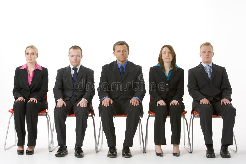 Group of Business People Sitting in a Line Stock Photo - Image of ...