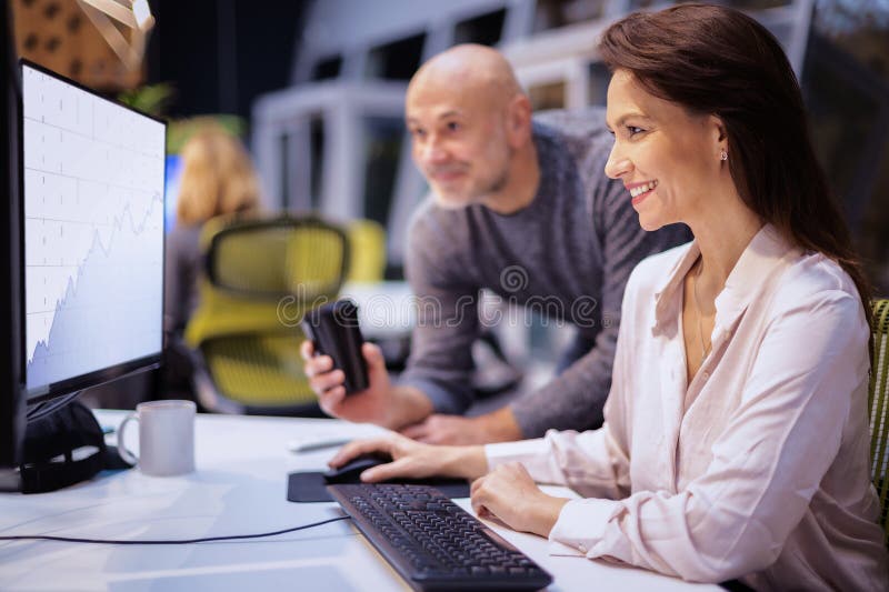Group of Business People Sitting and Standing at Office Desk Surrounded ...