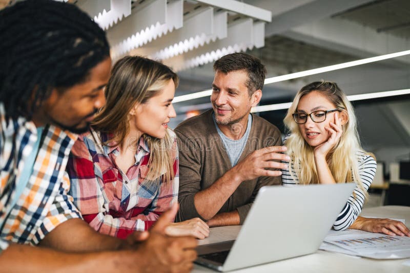 Group of Business People and Software Developers Working As a Team in ...