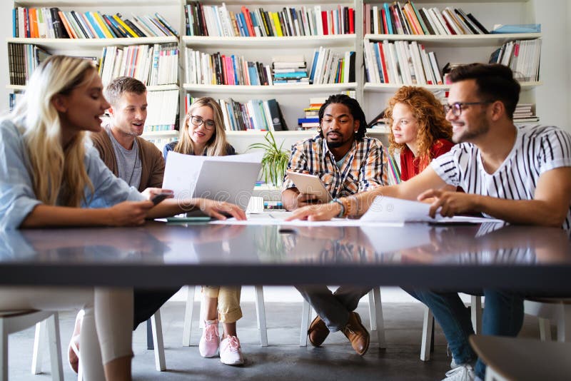 Group of Business People and Software Developers Working As a Team in ...