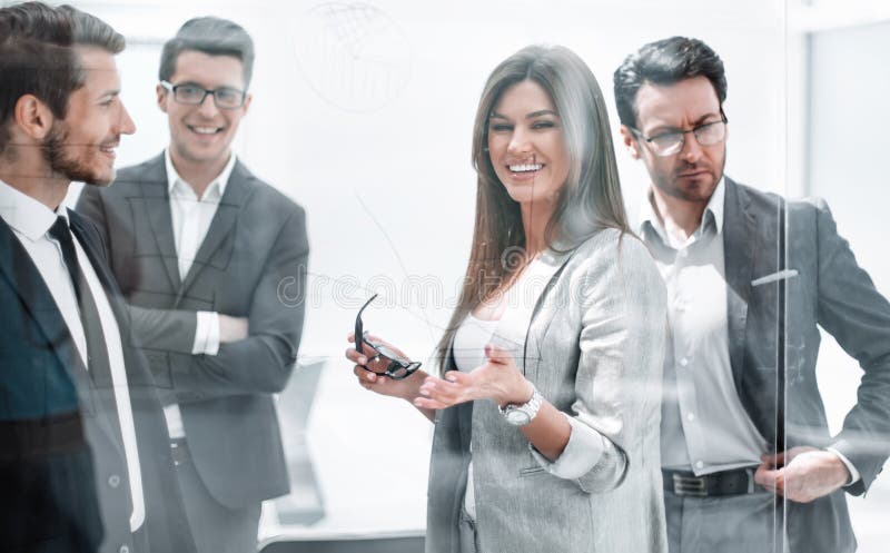Group of Business People Standing in a Modern Office Stock Image ...