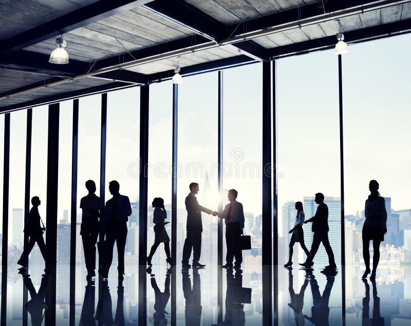 Group of Business People Standing in a Office Building Stock Photo ...