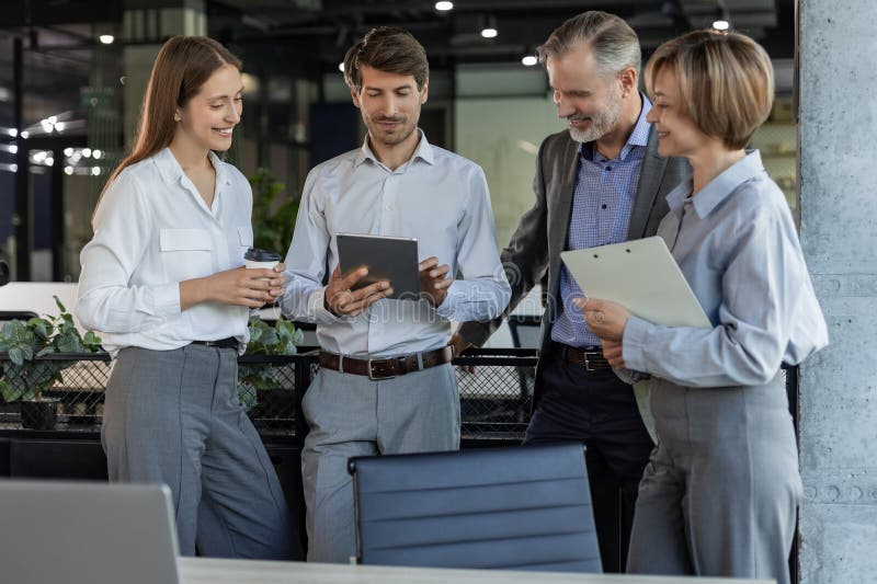 Group of Business People Standing Together and Discussing Their Work and Projects, Having a Team ...