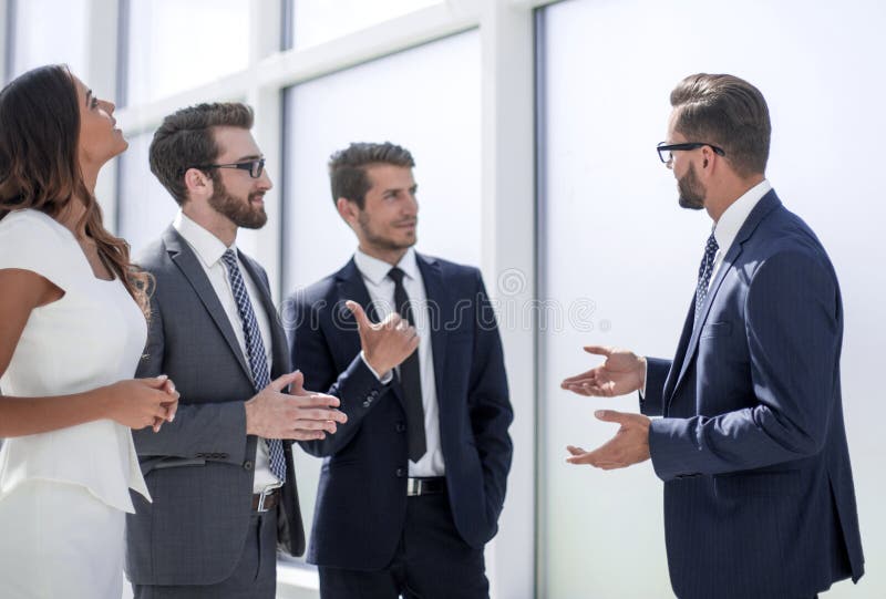 Group of Business People Talking Standing in the Lobby of the Office ...