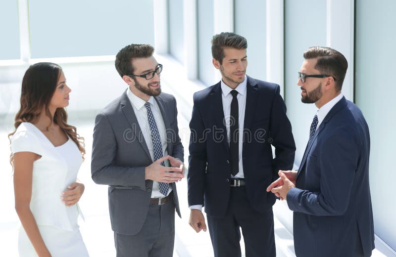 Group of Business People Talking ,standing in the Office Stock Photo ...
