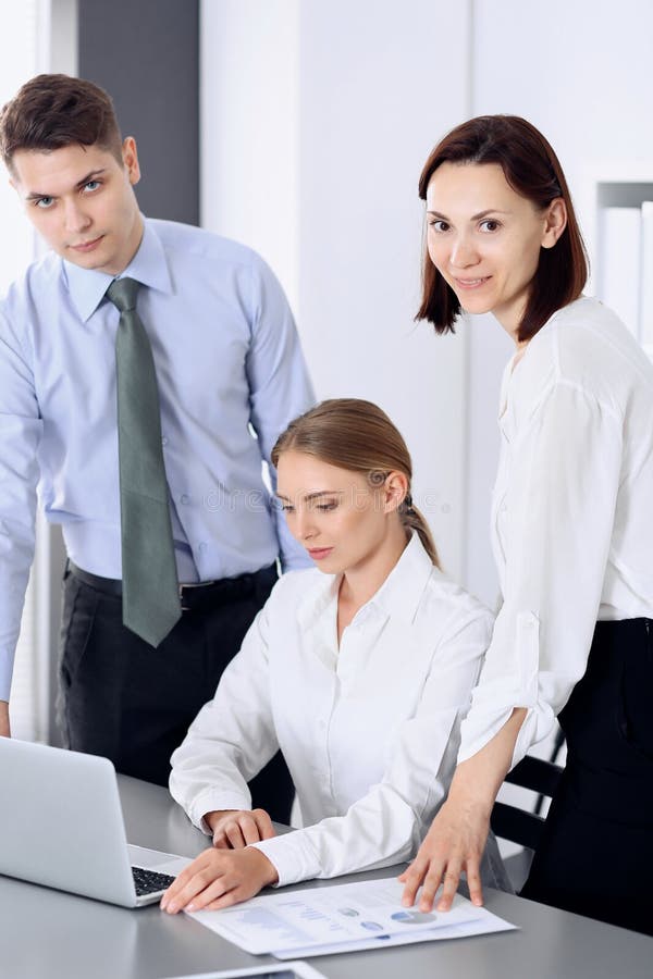 Group of Business People Using Computer in Office. Meeting and Teamwork ...