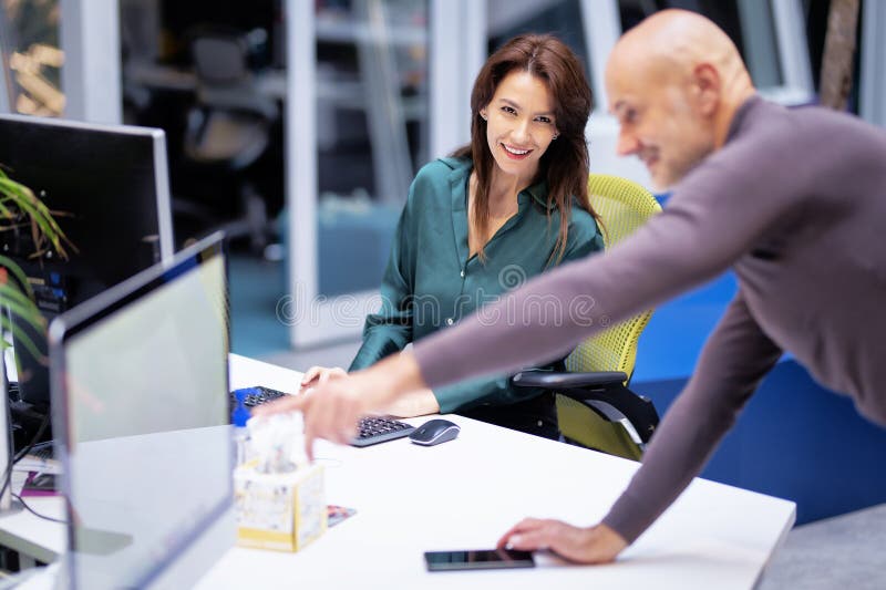 Group of Business People Using Computer and Working Together in a ...
