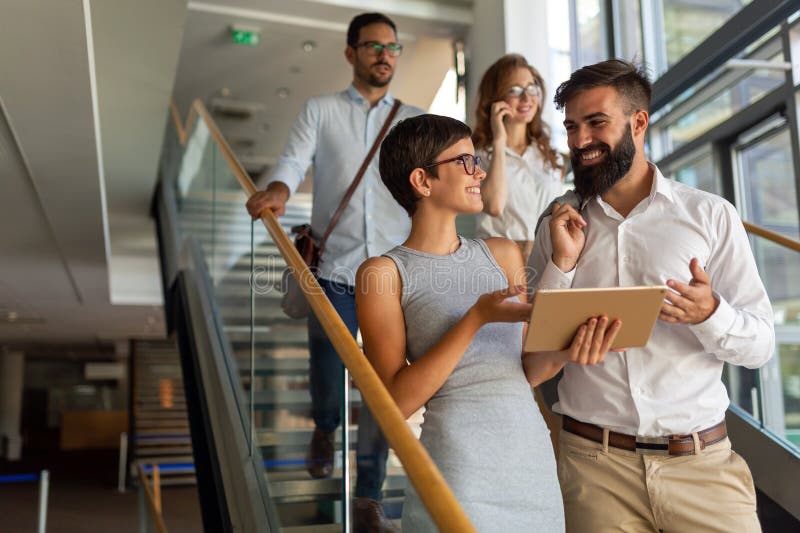 Group of Business People Using a Digital Tablet Together, Meeting and ...