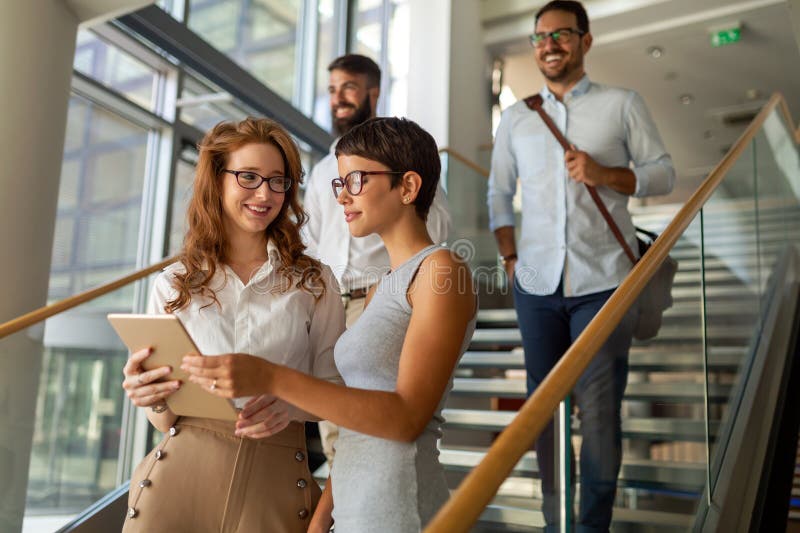 Group of Business People Using a Digital Tablet Together, Meeting and ...