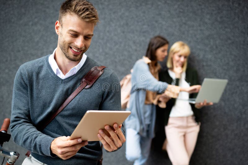 Group of Business People Using Electronic Devices Outdoor Stock Photo ...