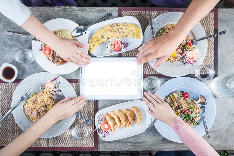 Group of Business People Using Electronic Devices at Work. Stock Image ...