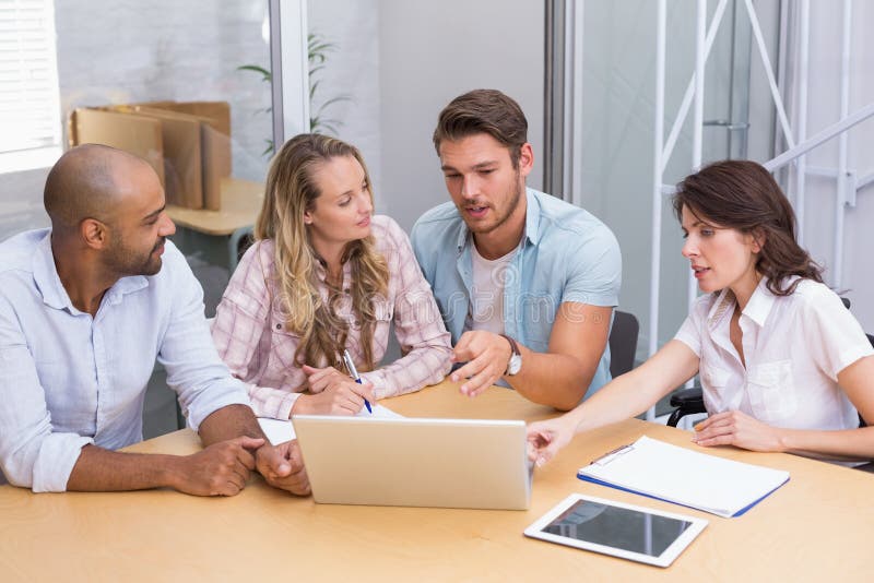Group of Business People Using Tablet Computer and Laptop Stock Photo ...