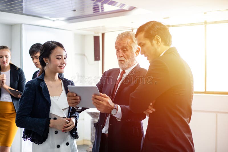 Group of Business People Using Tablets for Meetings in Conference Rooms ...