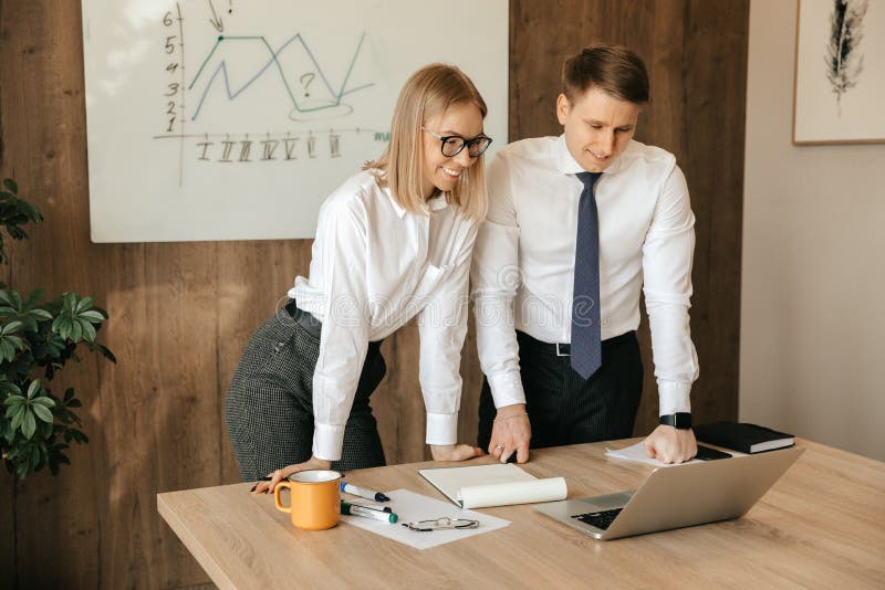 A Group of Business People Working in the Office and Discussing New Ideas. Team Work Together ...