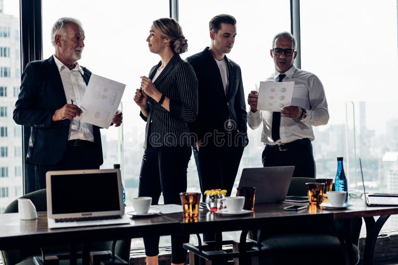 Group of Business People Working on Project at Modern Startup Office ...