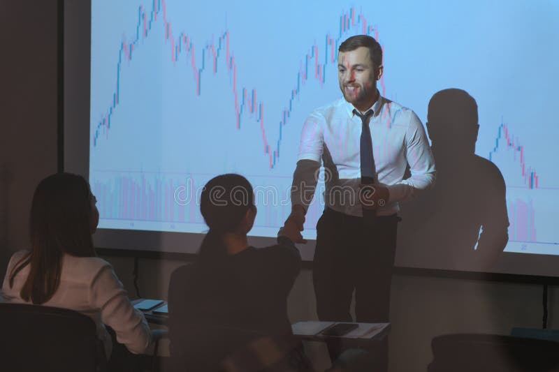 Group of Business People Working. Technical Price Graph and Indicator ...