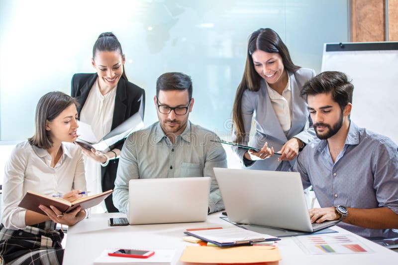Group of Business People Working Together in Office. Stock Photo ...
