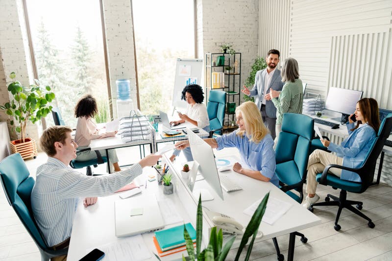 Group of Business Professionals Collaborating in a Bright and Modern ...