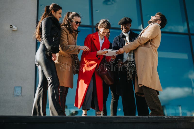 Group of Business Professionals Collaborating Outdoors Under the Bright ...