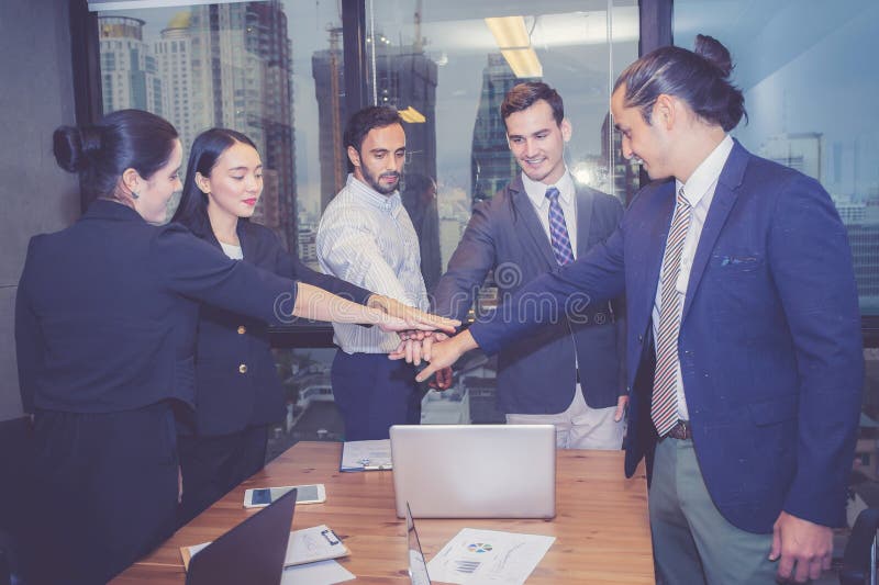 Group Business Team Collaboration and Unity while Hand Stacking with ...