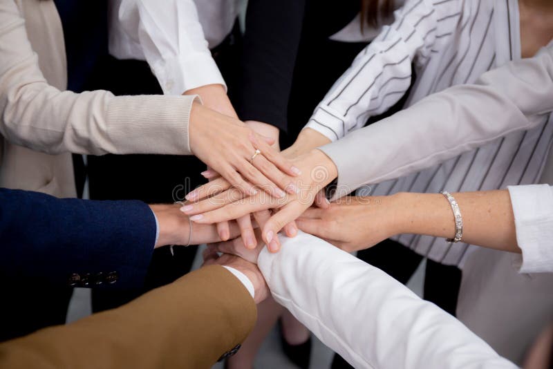 Group of Business Team Harmonious with Man and Woman Joining Hands ...