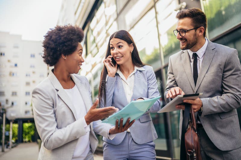 Business Team Meeting Outside Stock Image - Image of contract ...