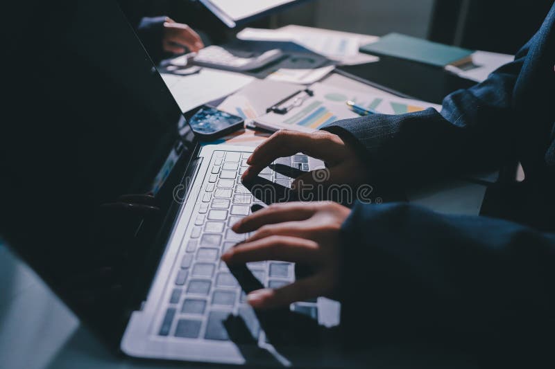 Group of Business Women Working on a Financial Data Expenses Document ...