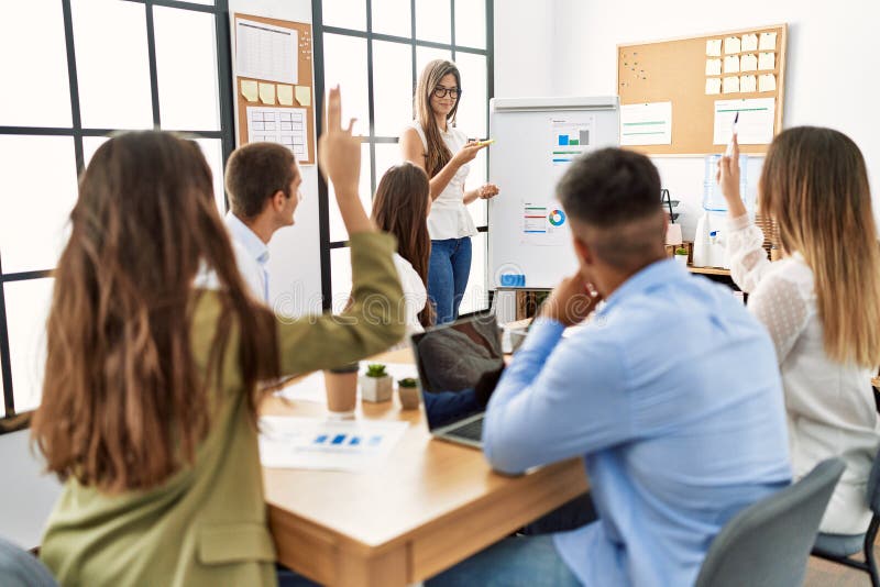 Group of Business Workers on Chart Board Presentation at the Office ...