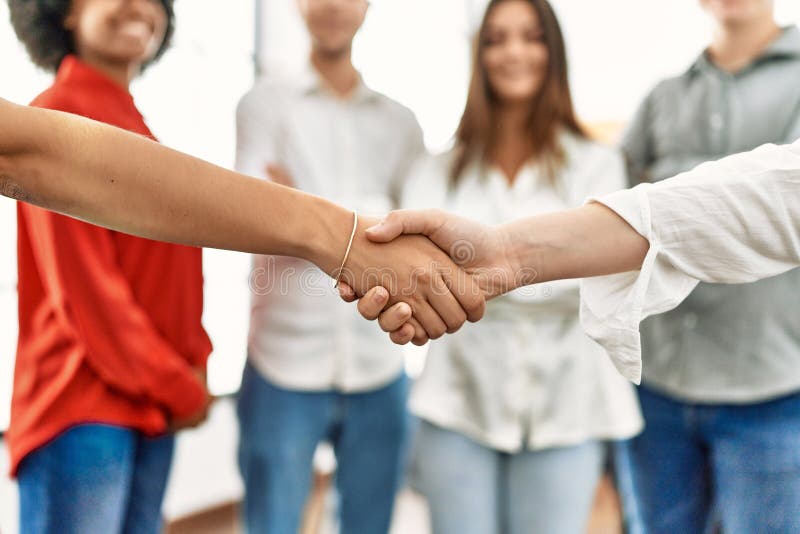 Group of Business Workers Looking Partners Handshake at the Office ...