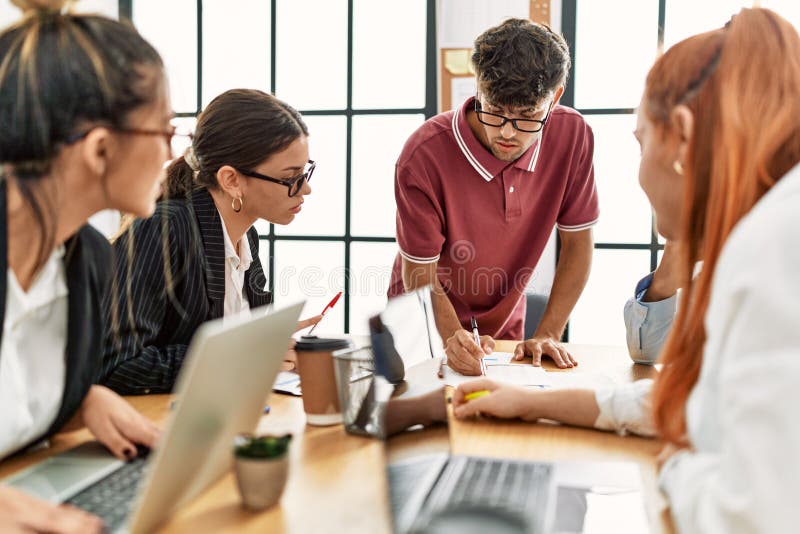 Group of Business Workers with Serious Expression Working at the Office ...