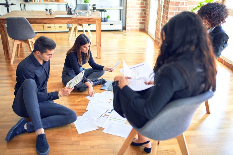 Group of Business Workers Sitting on the Floor Relaxed Stock Photo ...