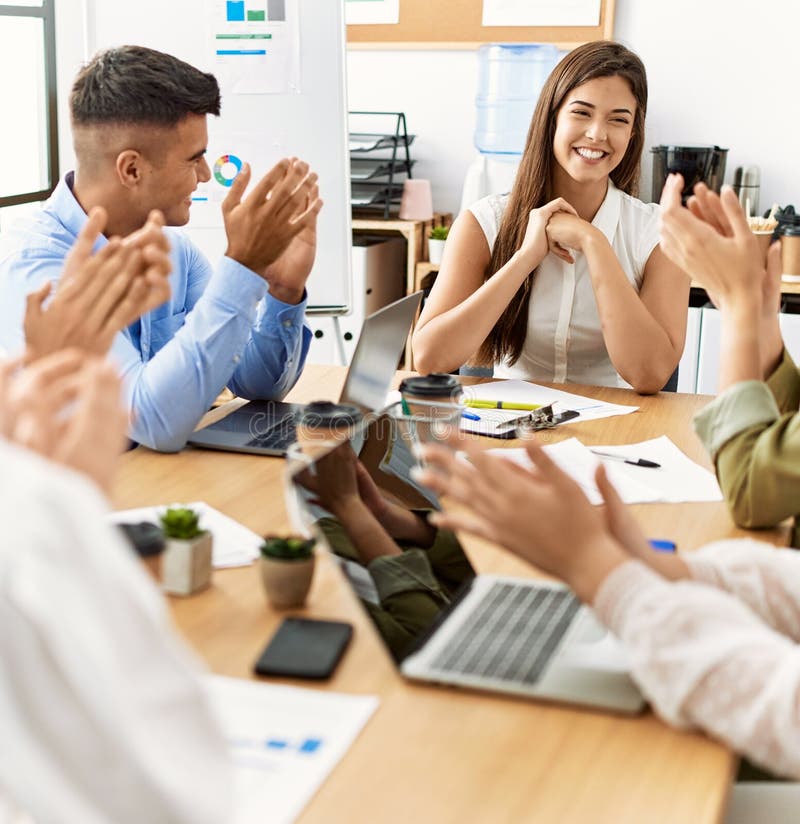 Group of Business Workers Smiling and Clapping To Partner at the Office ...