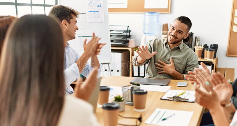 Group of Business Workers Smiling and Clapping To Partner at the Office ...