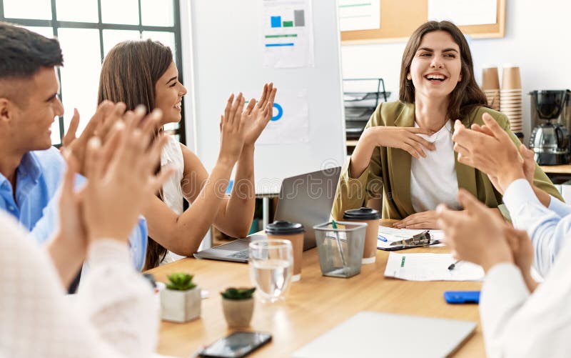 Group of Business Workers Smiling and Clapping To Partner at the Office ...
