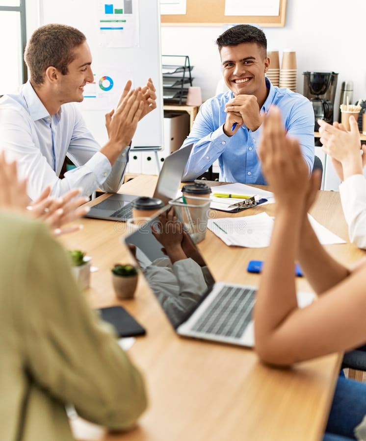 Group of Business Workers Smiling and Clapping To Partner at the Office ...